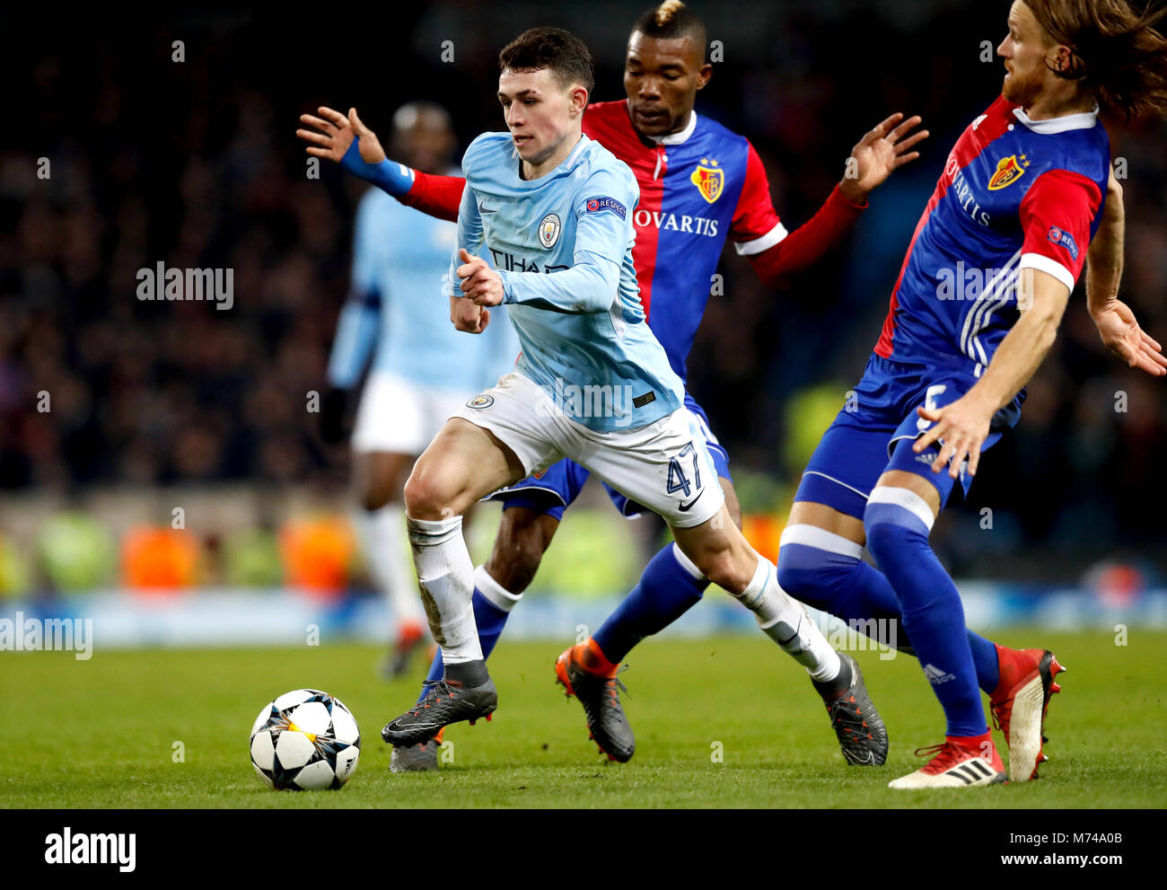 Manchester City's Phil Foden (left) in action Stock Photo - Alamy