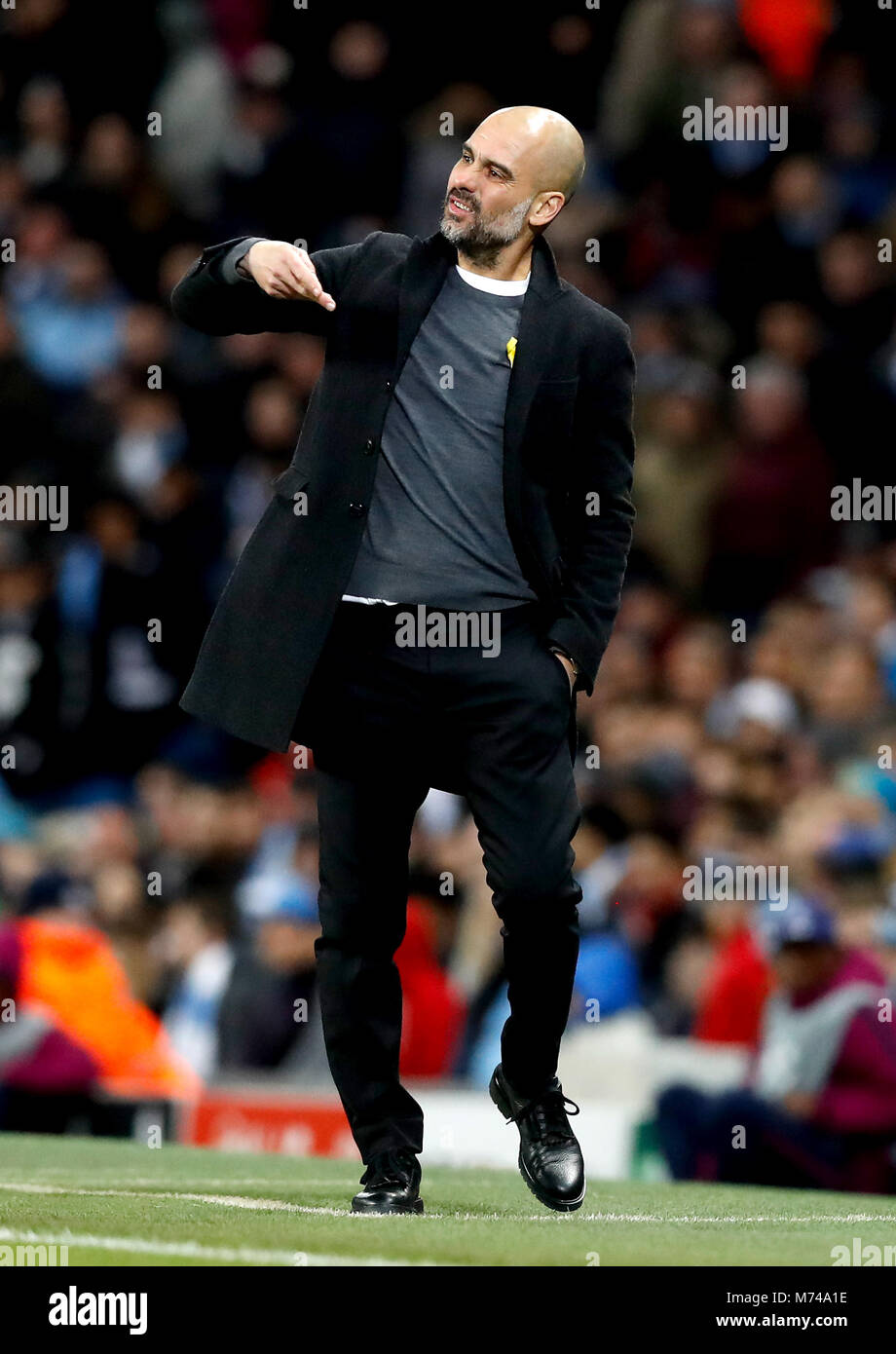 Manchester City manager Pep Guardiola gestures on the touchline Stock ...