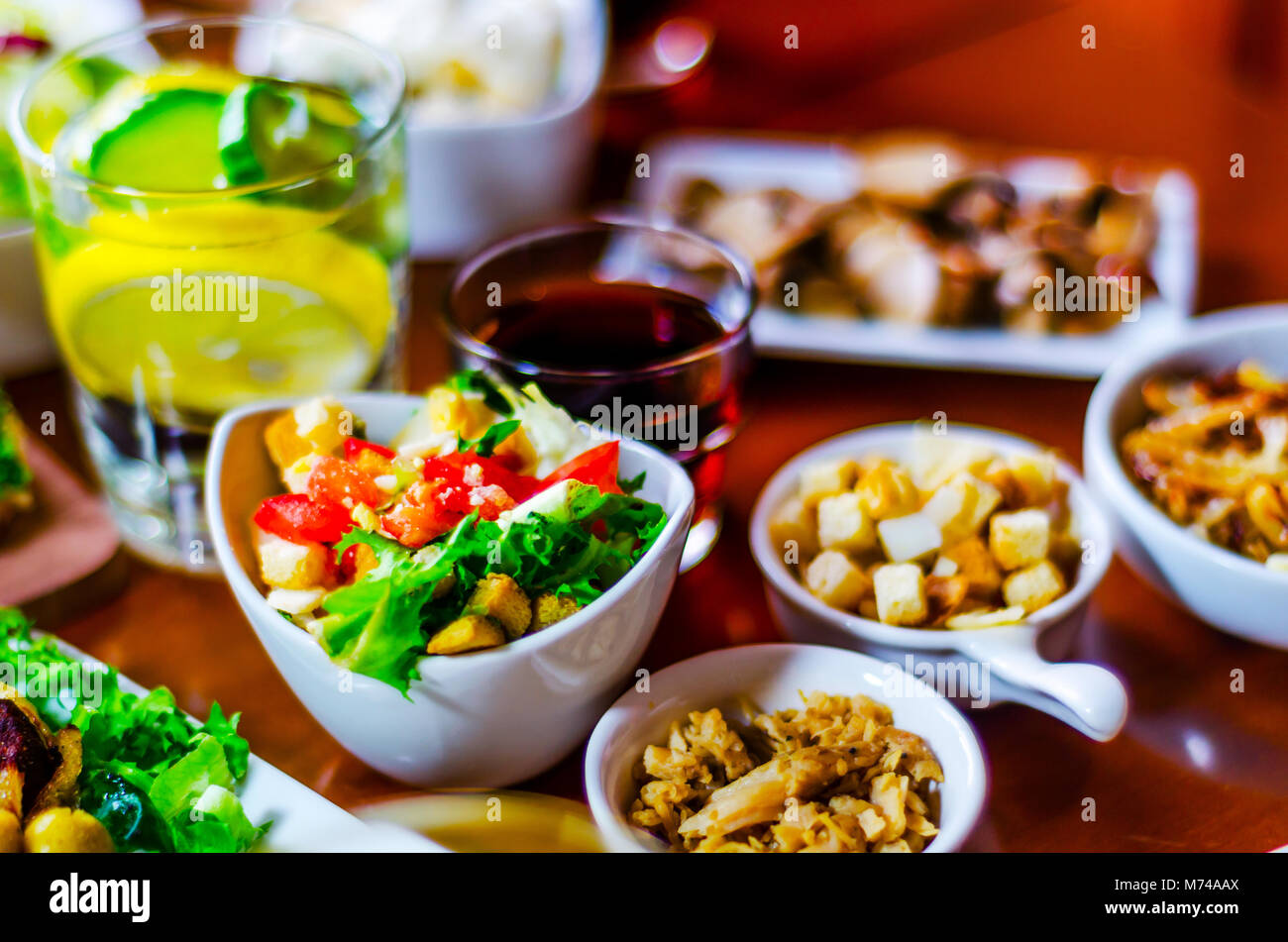 Set with different appetizers in small portions, healthy and delicious ...