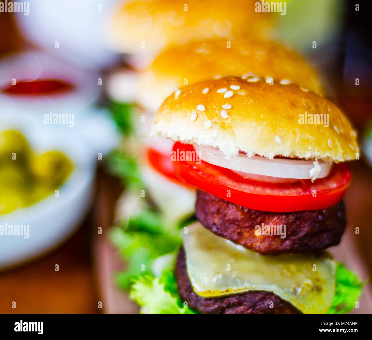 mini burgers with meat, vegetables, cheese and other toppings, bread ...