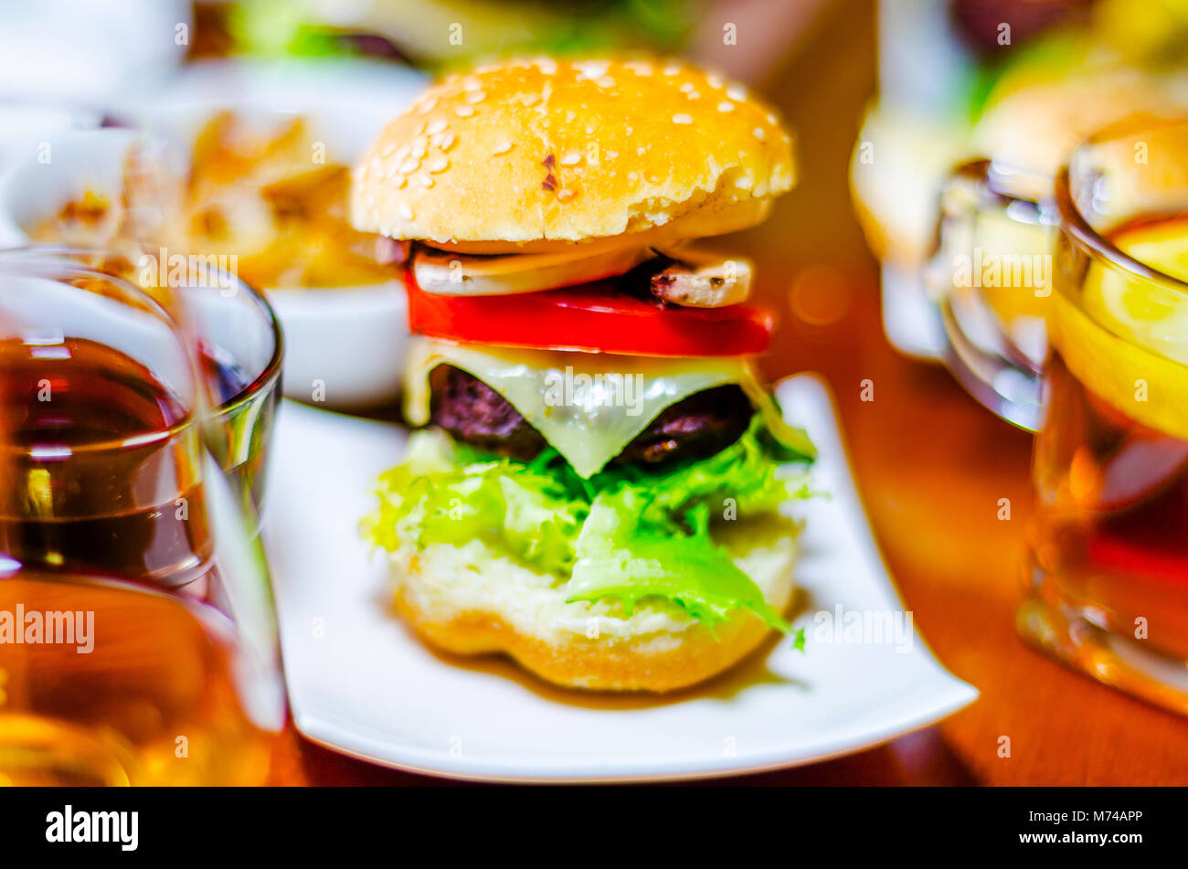 mini burgers with meat, vegetables, cheese and other toppings, bread ...