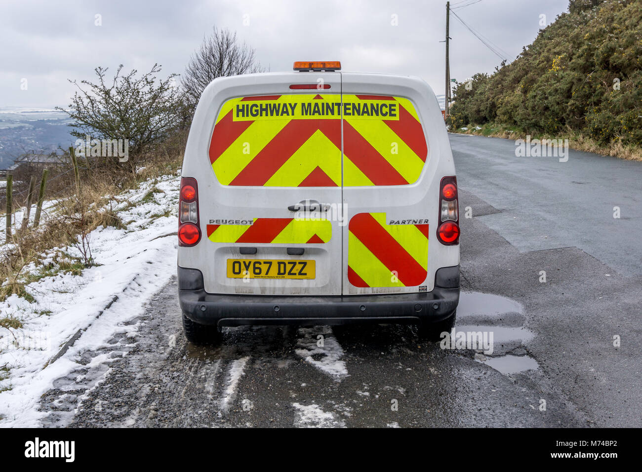 Rear view of and Highway Maintenace van parked on Lumb Lane, Castlehill ...