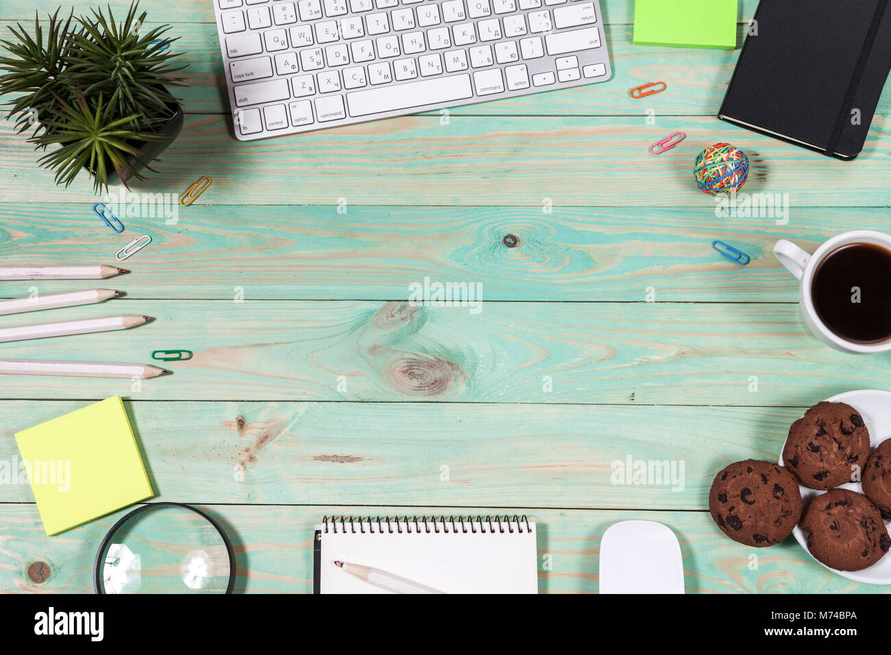 Office table desk with set of colorful supplies Stock Photo - Alamy