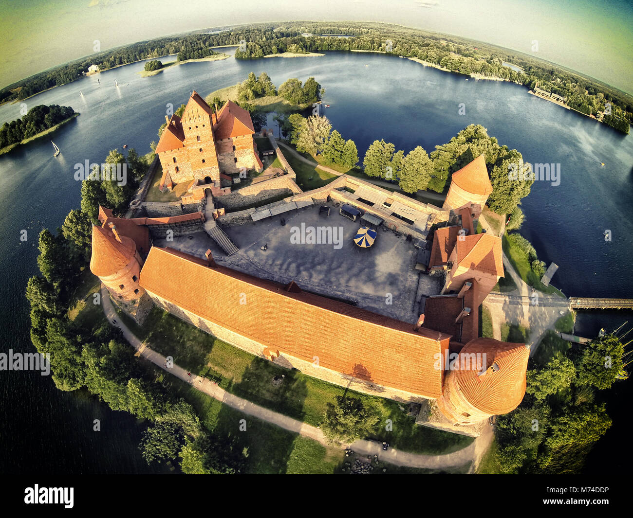 Trakai Castle vinius summer Drone phoro wide lens ntowers, ner the lake ...