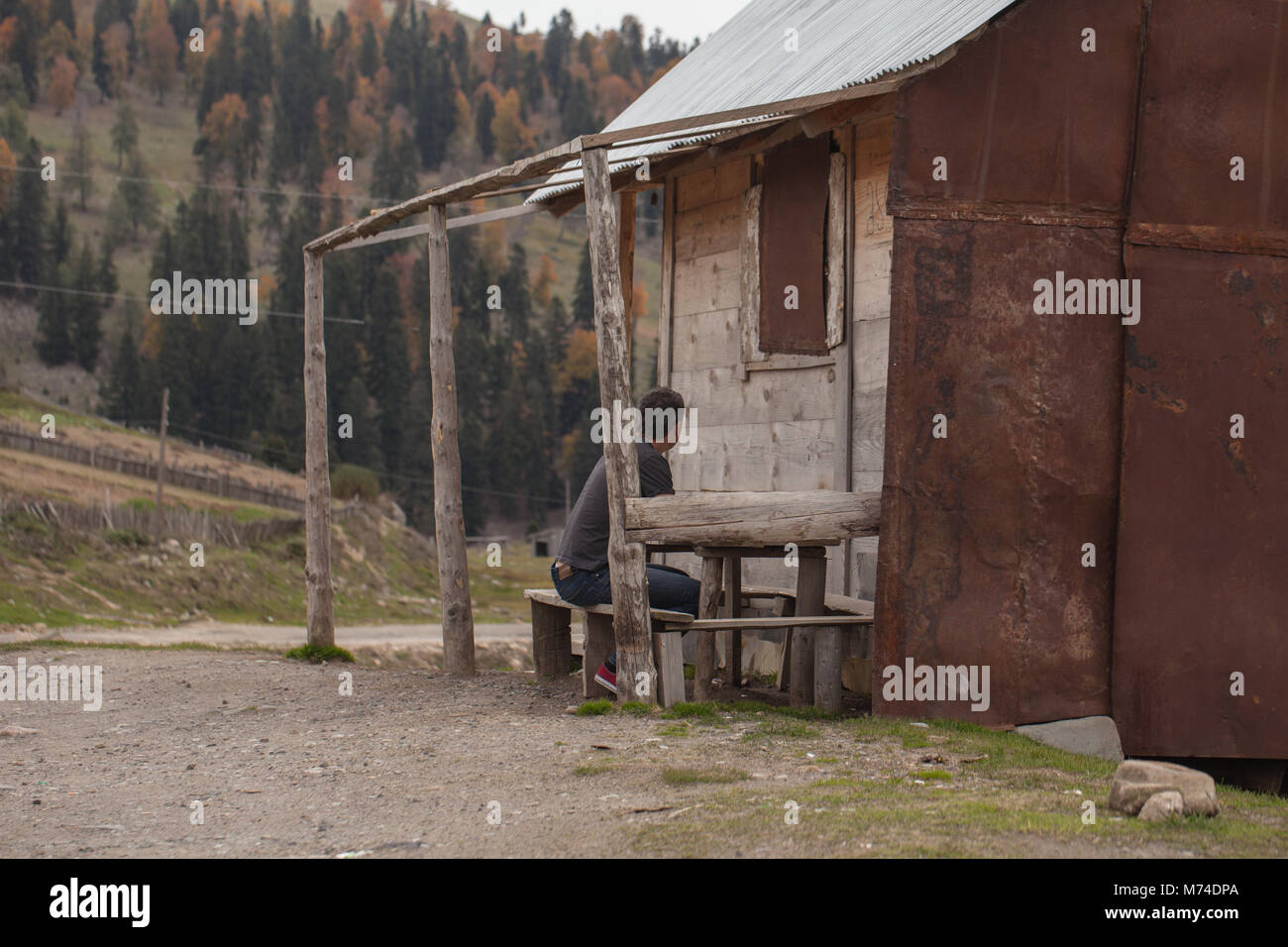 old wooden houses in a mountain, Georgian village, poor people live ...