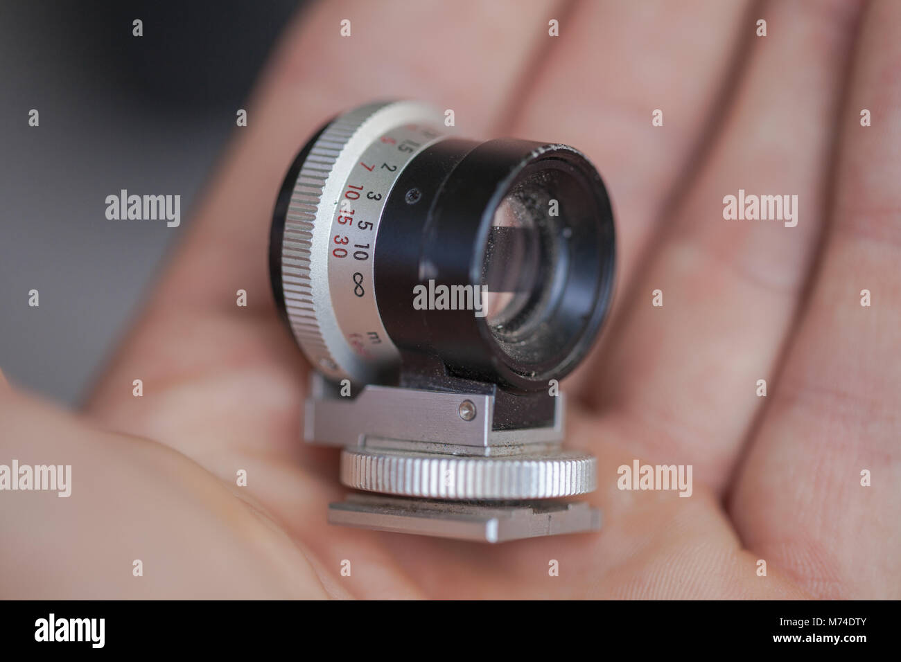 Professional Mini compact optical macro camera lens in the hand Stock ...