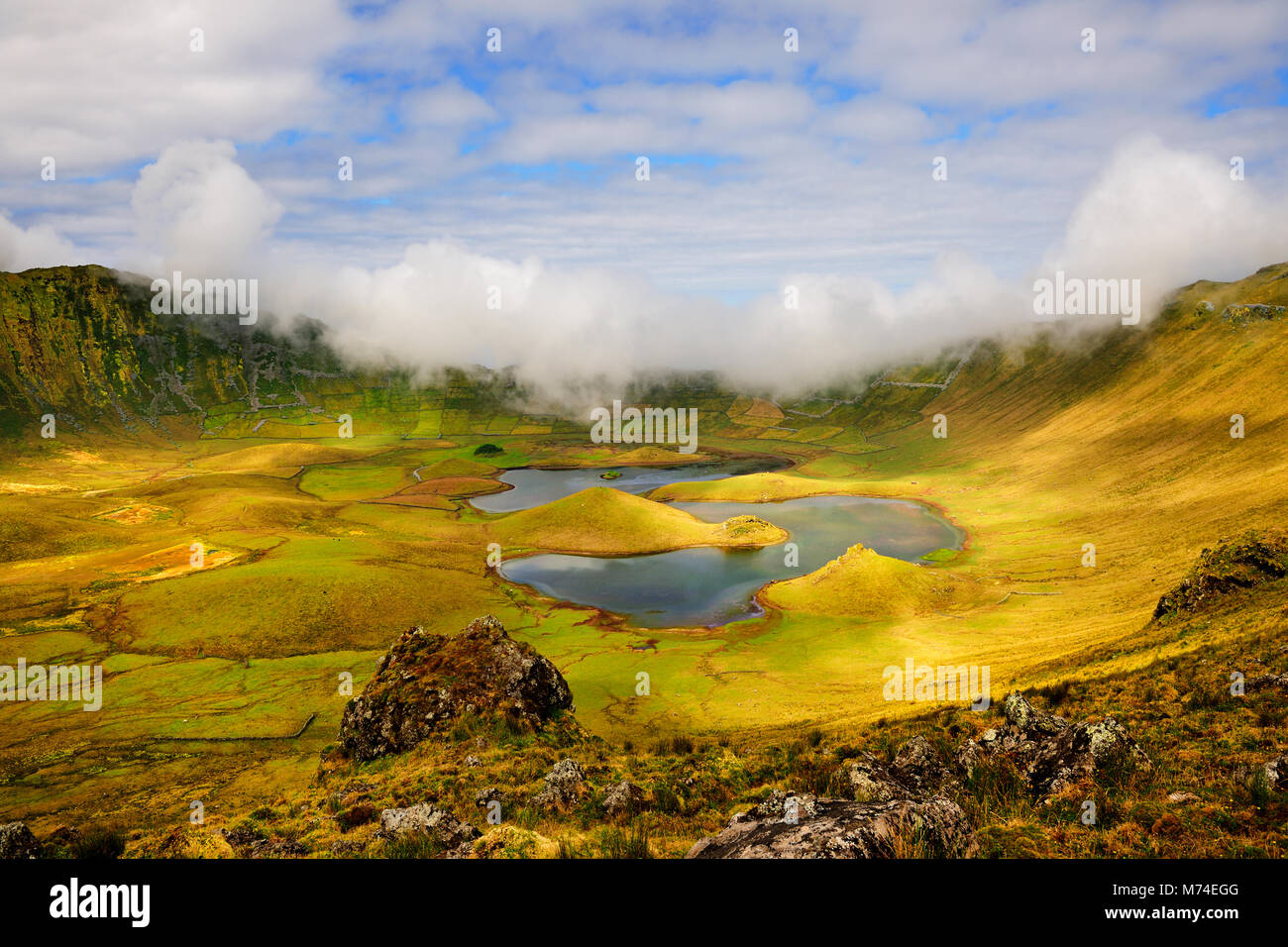 The volcanic crater (Caldeirão) with a beautiful lake on the top of ...