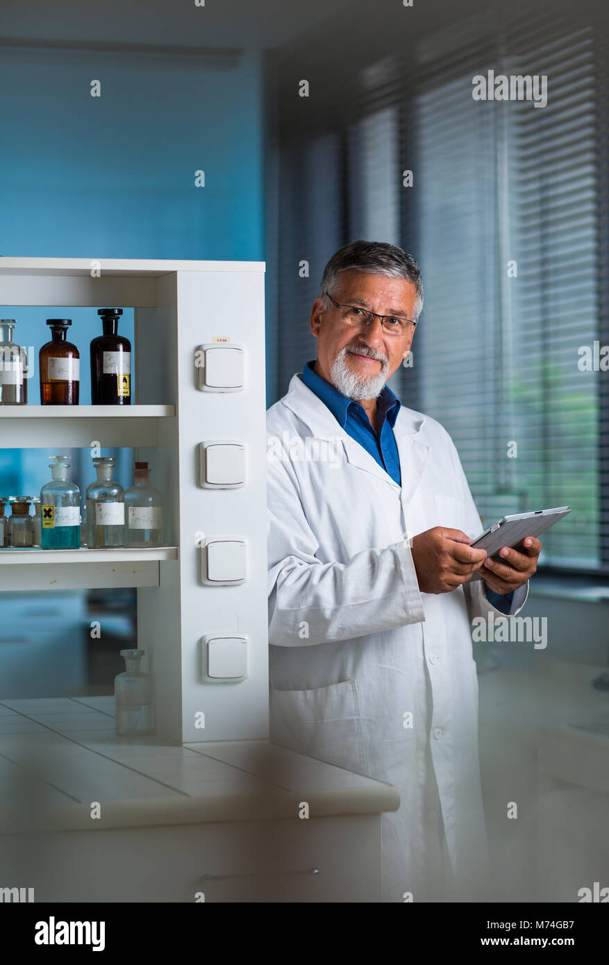Senior chemistry professor/doctor in a lab (color toned image Stock ...