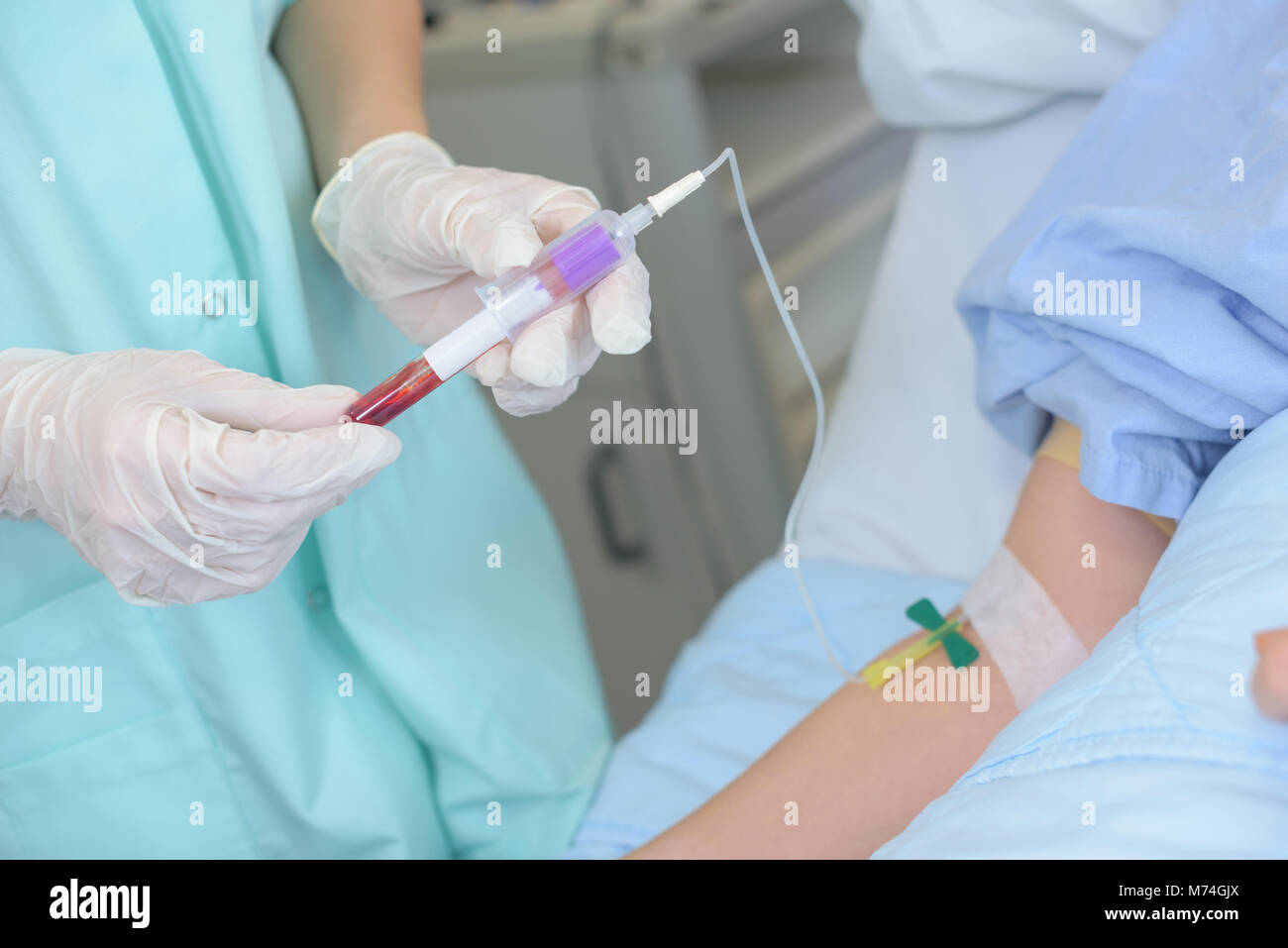 taking blood sample Stock Photo - Alamy