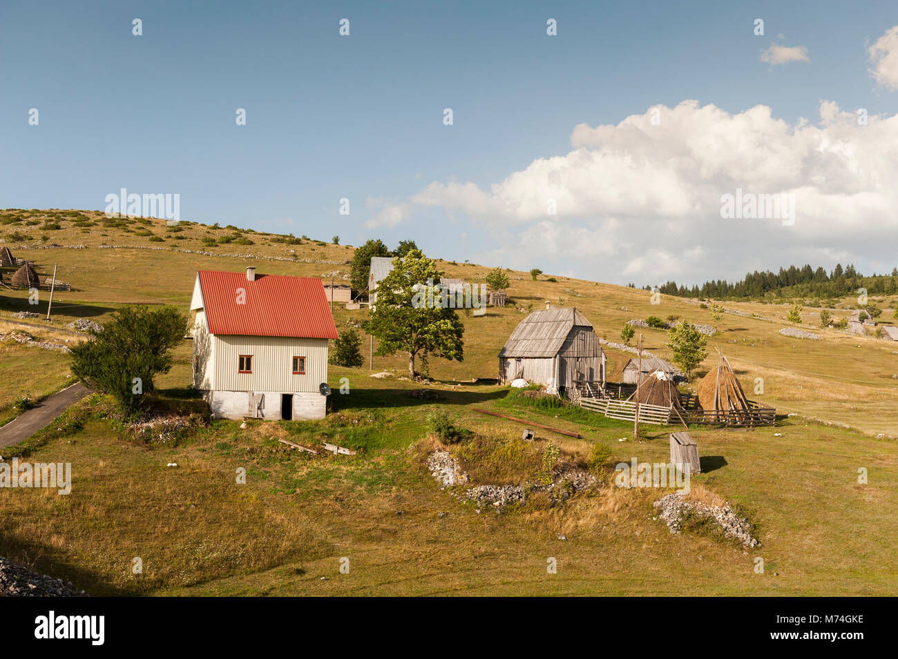 Rural village in Montenegro before sunset with nice light and authentic ...