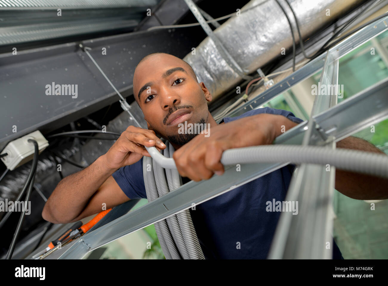 Installing cables hi-res stock photography and images - Alamy