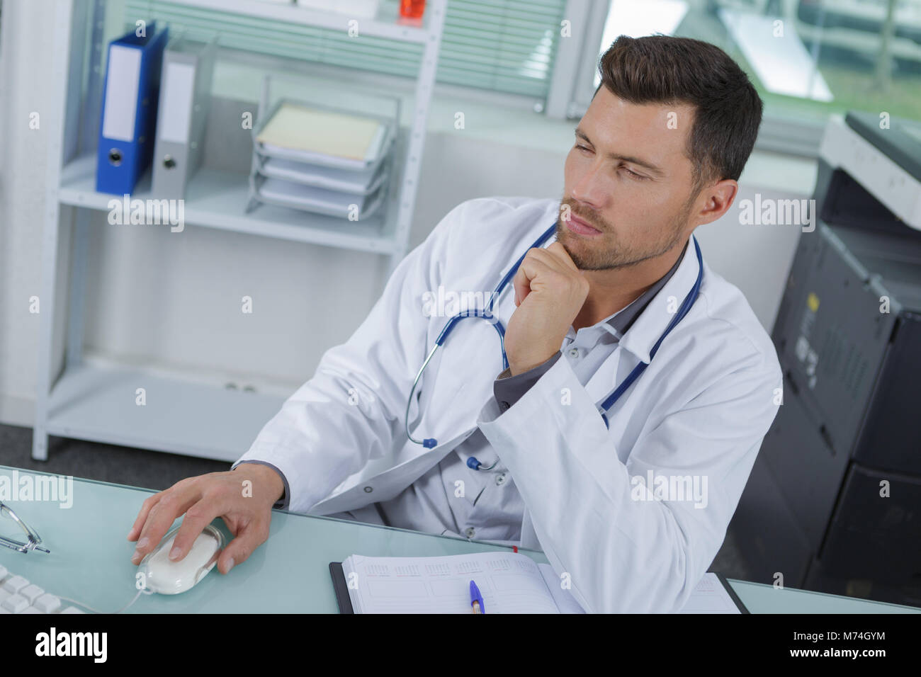 Physical therapist with computer hi-res stock photography and images ...