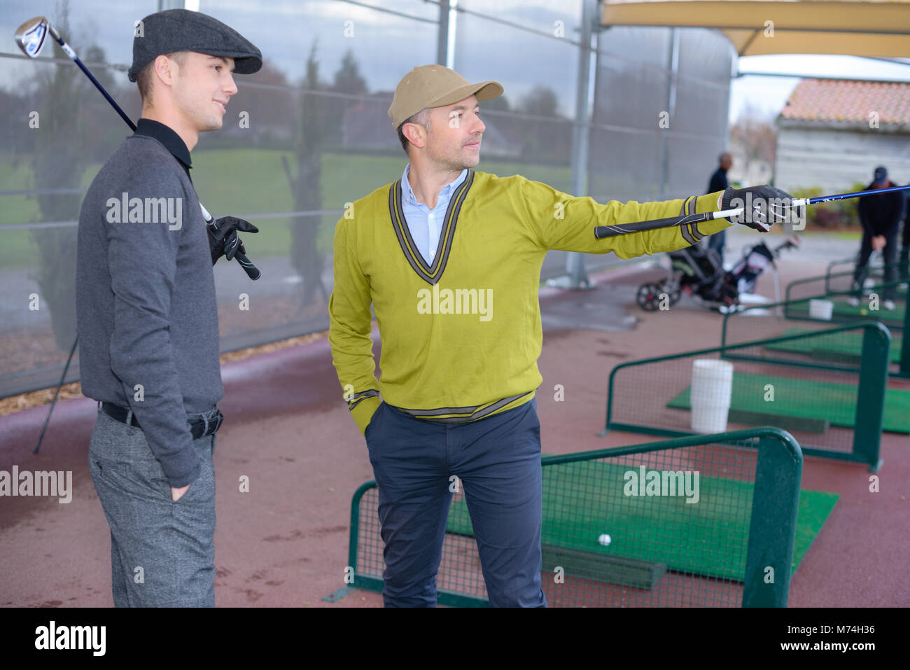 golfers talking after a game Stock Photo - Alamy