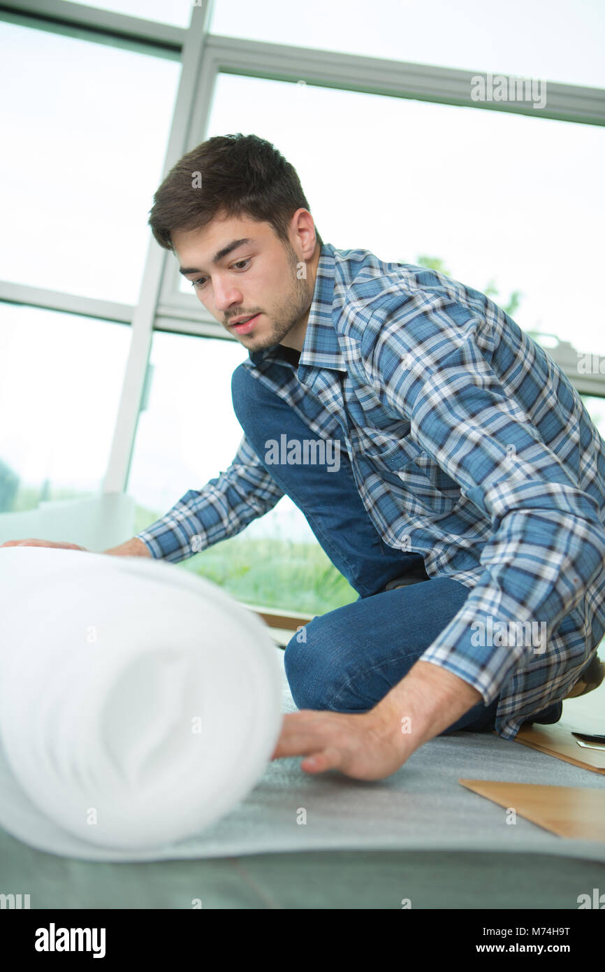 Worker laying insulation on hi-res stock photography and images - Alamy