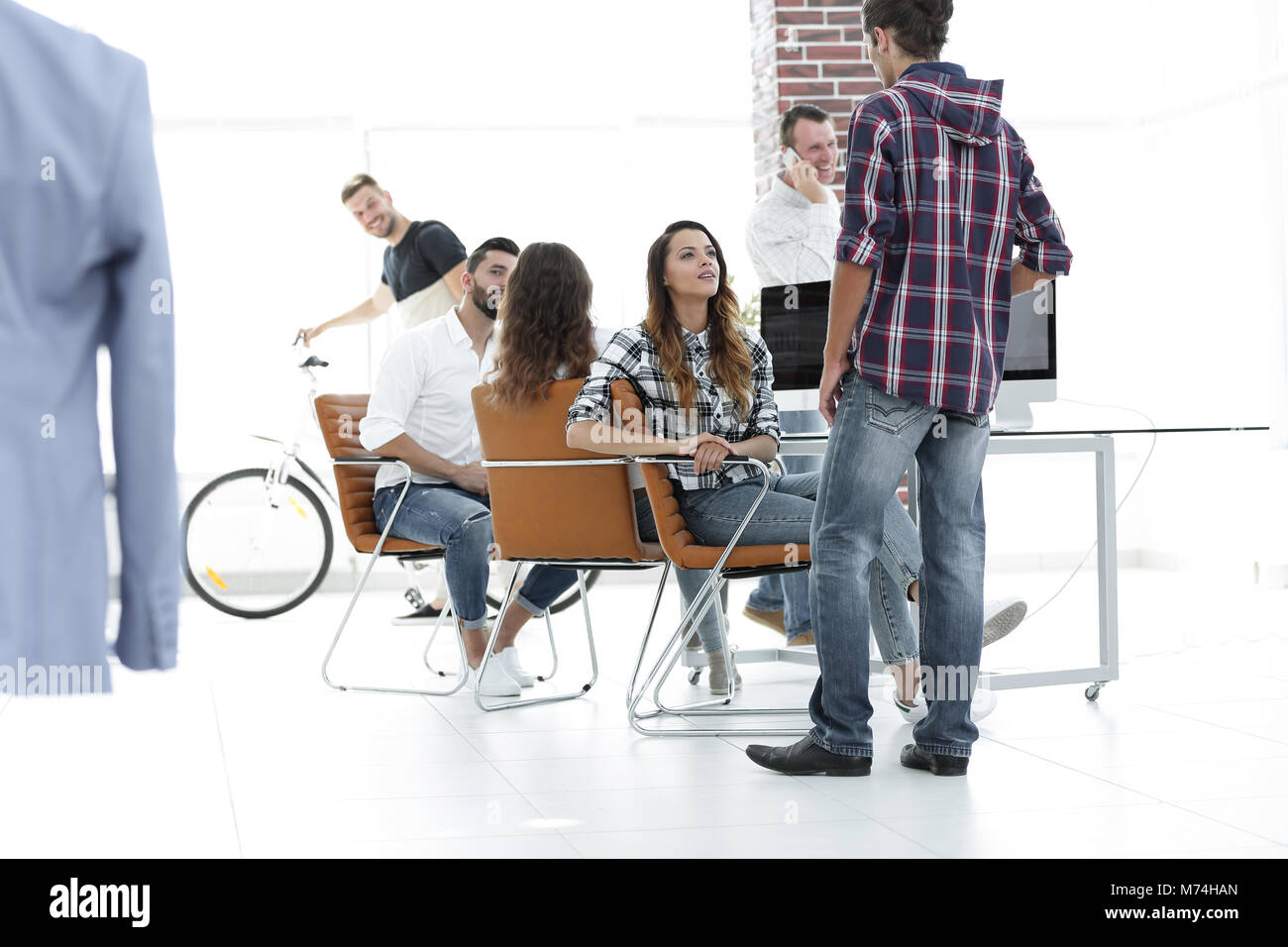 employees of modeling agencies on the workplace Stock Photo - Alamy