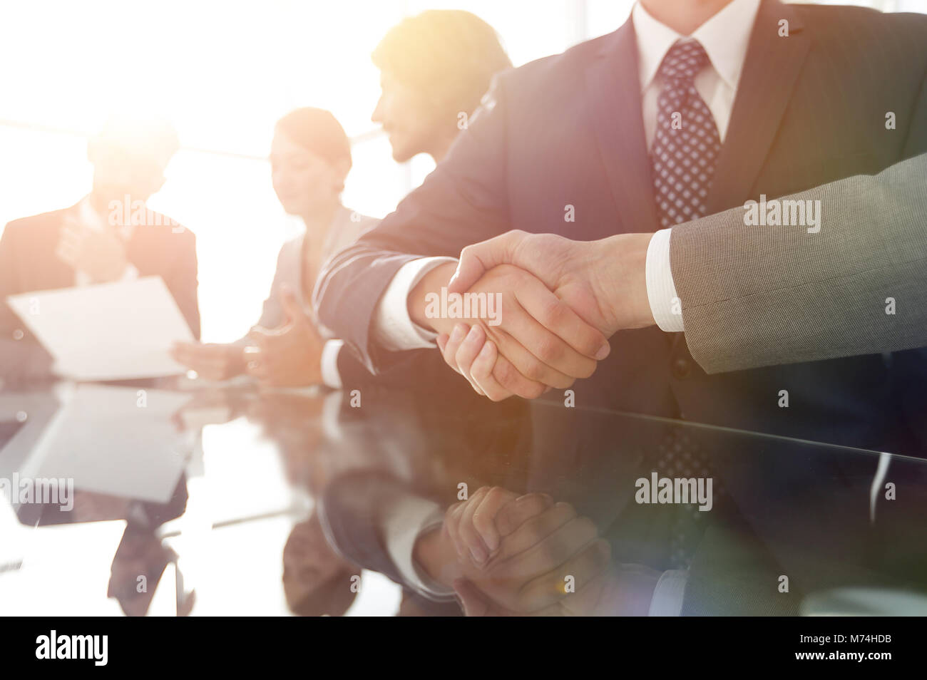 handshake business partners at the meeting Stock Photo - Alamy