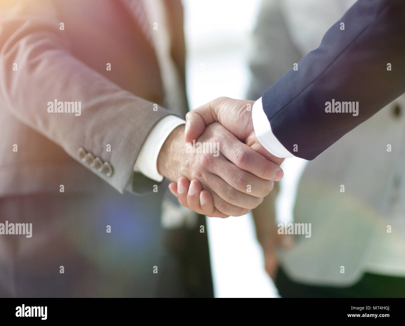 closeup of handshake of business partners Stock Photo - Alamy