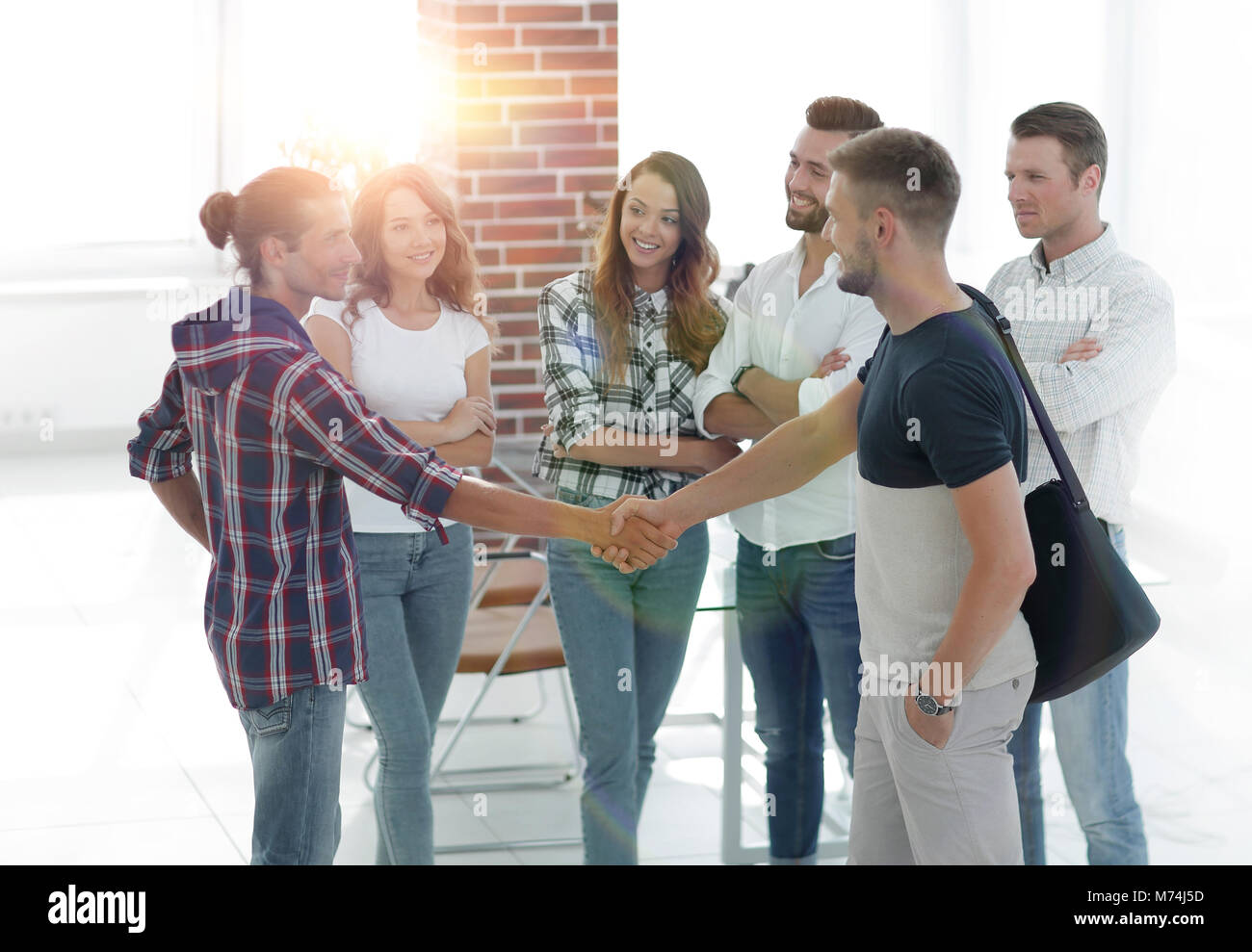 handshake Manager and customer in the office Stock Photo - Alamy