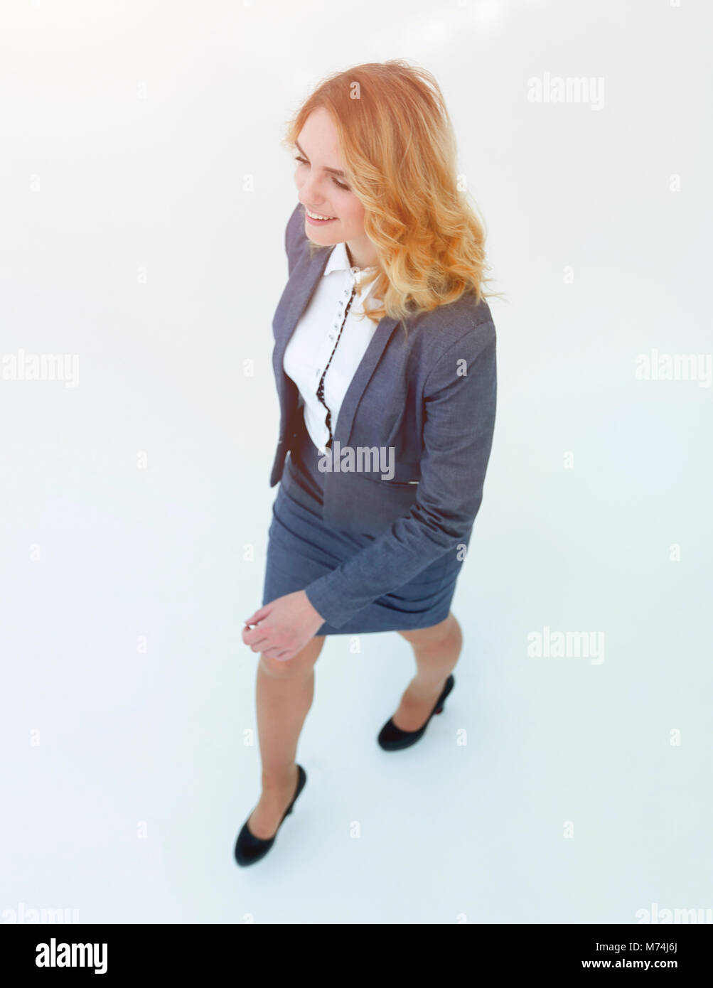 young business woman walking forward Stock Photo - Alamy