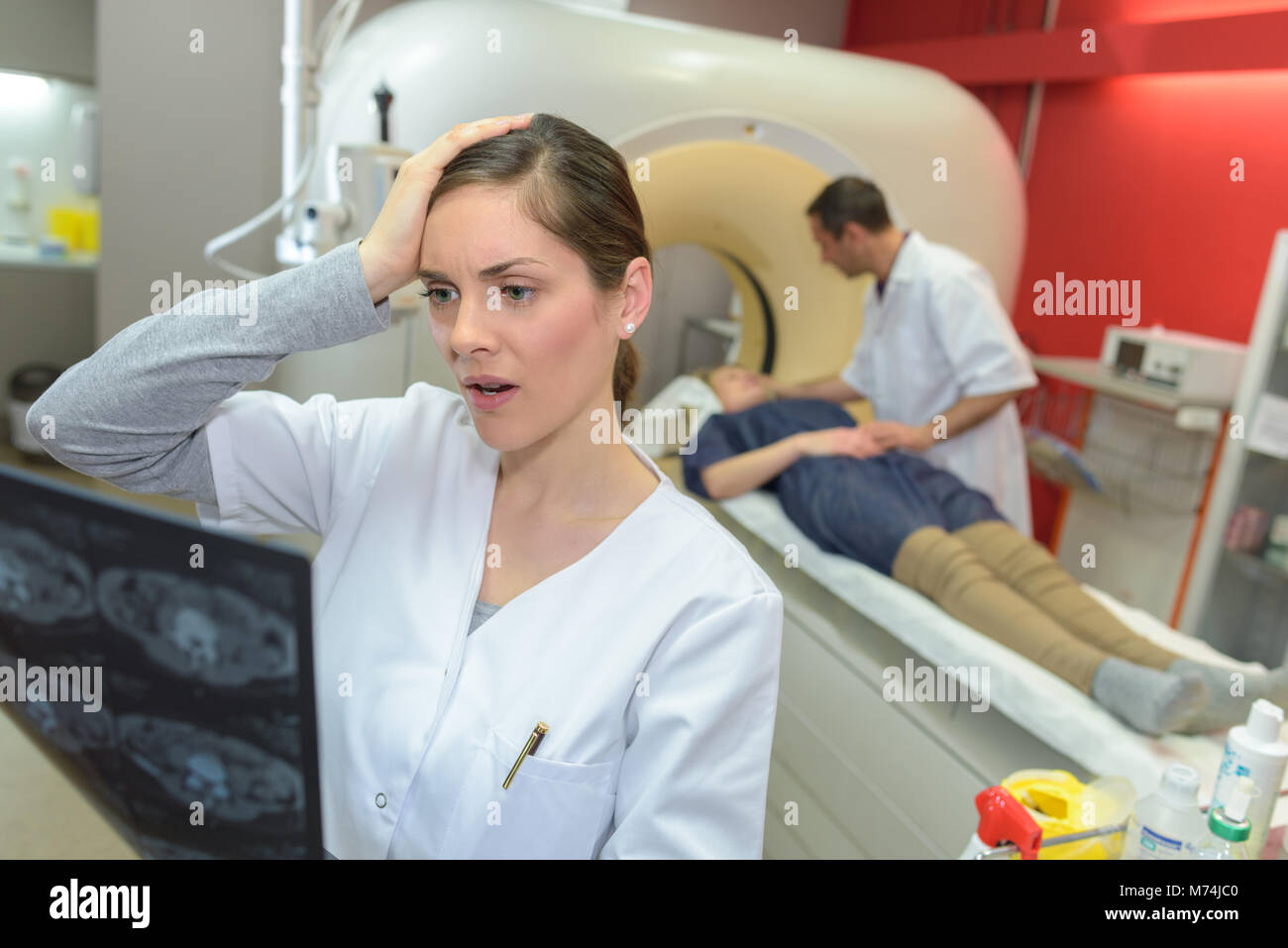 mri technician shock with the result Stock Photo - Alamy
