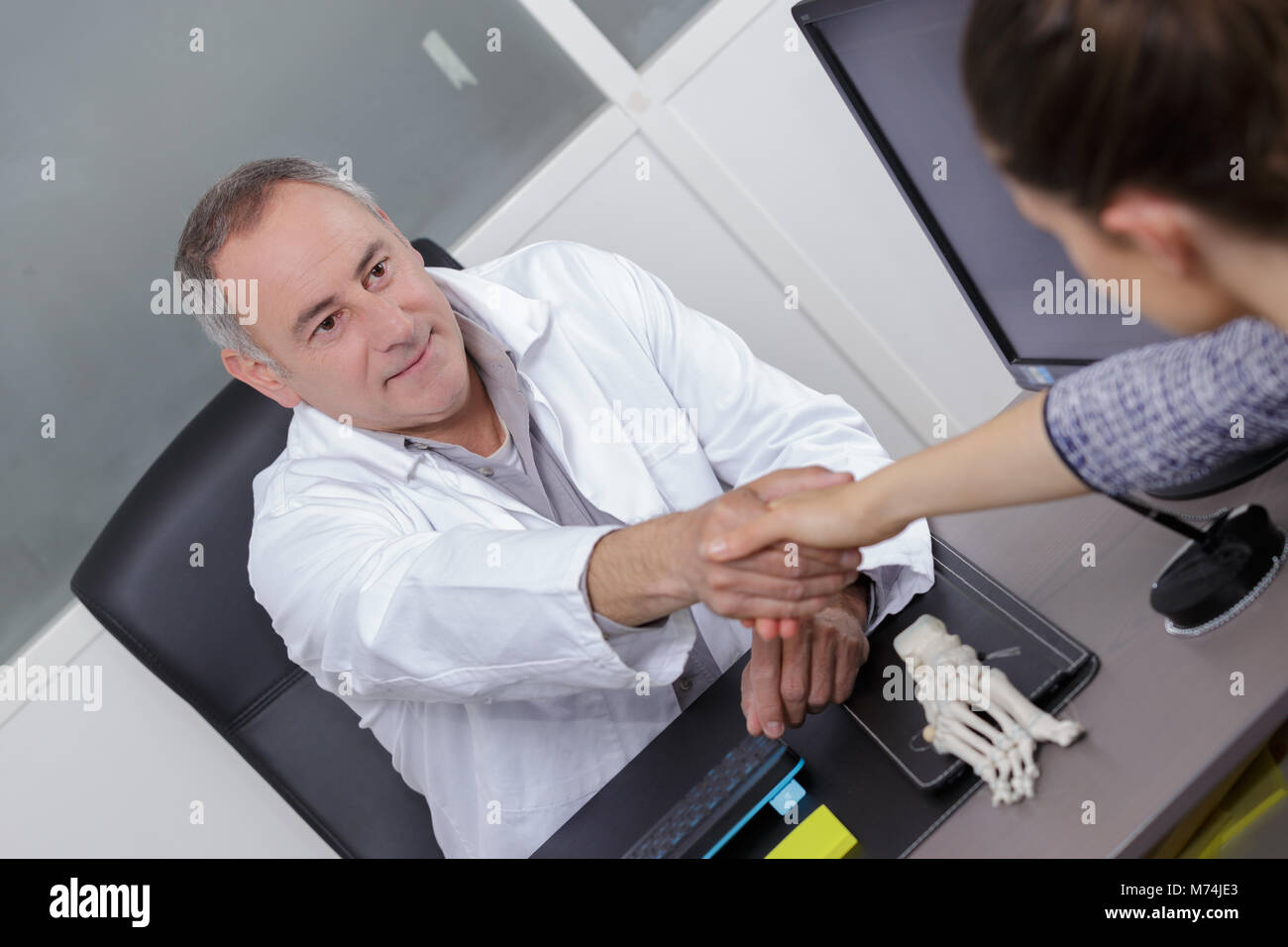doctor handshake with a patient at office in hospital Stock Photo - Alamy