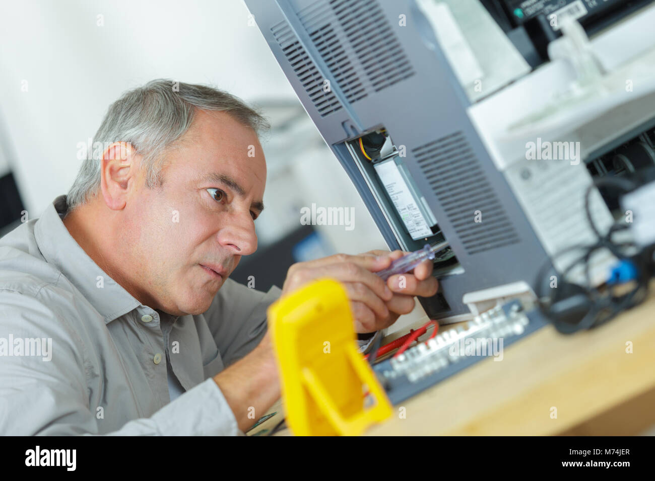 worker calibrating a printer Stock Photo - Alamy