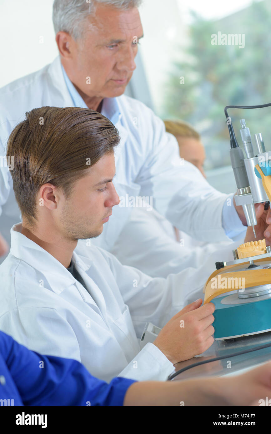 Dental lab technicians hi-res stock photography and images - Alamy
