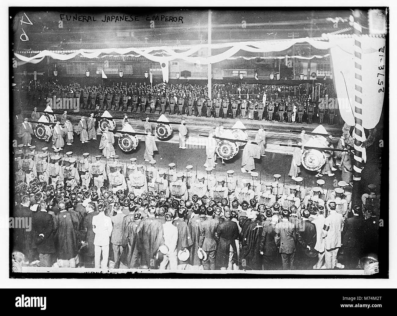 A photograph documenting the funeral of the Japanese Emperor, capturing ...