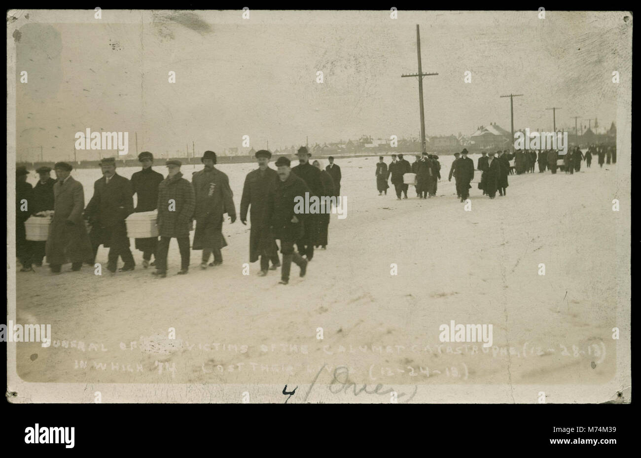 This somber photograph captures the funeral of victims from the Italian ...