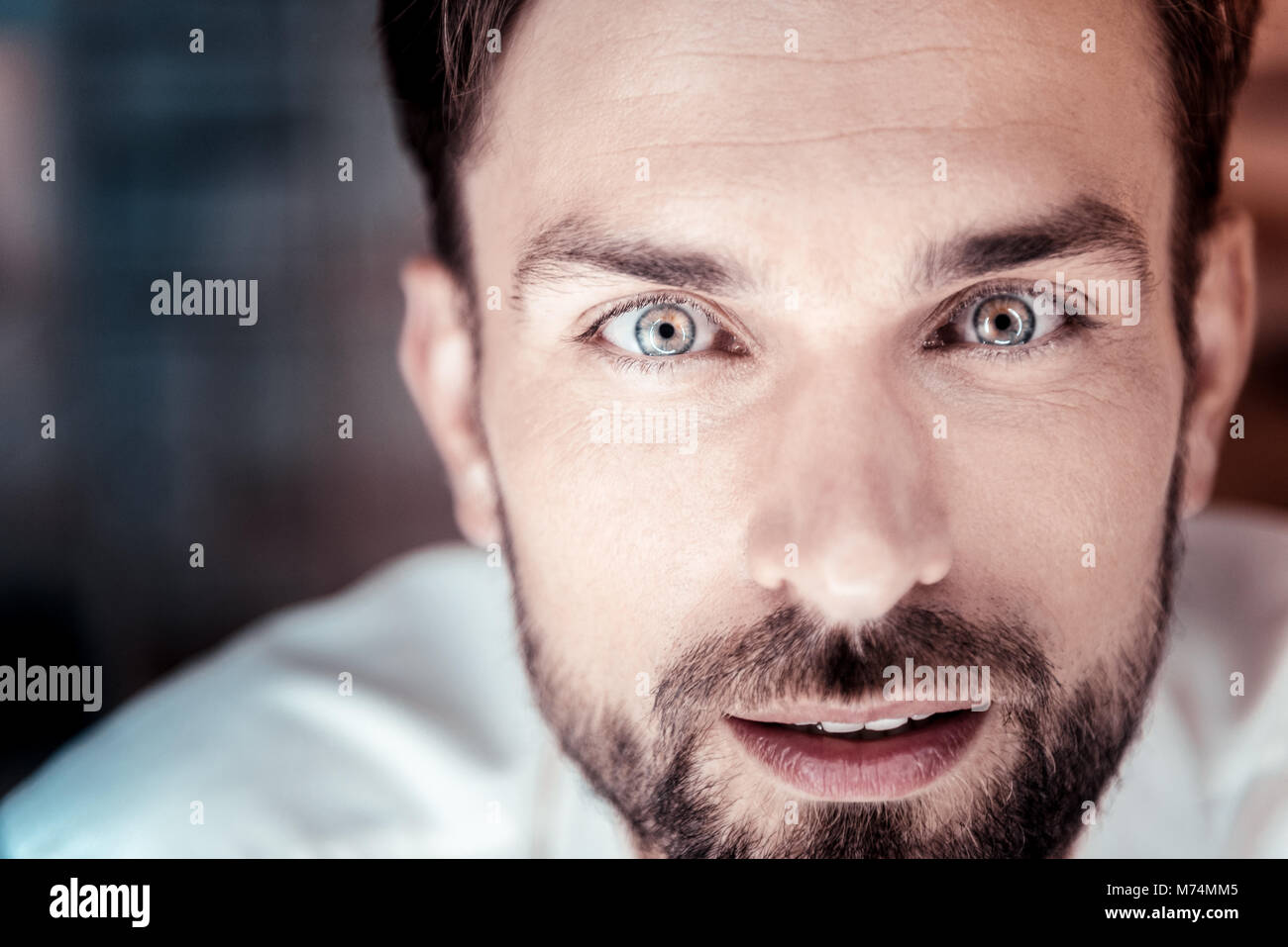 Interested surprised man looking straight opening his mouth Stock Photo ...