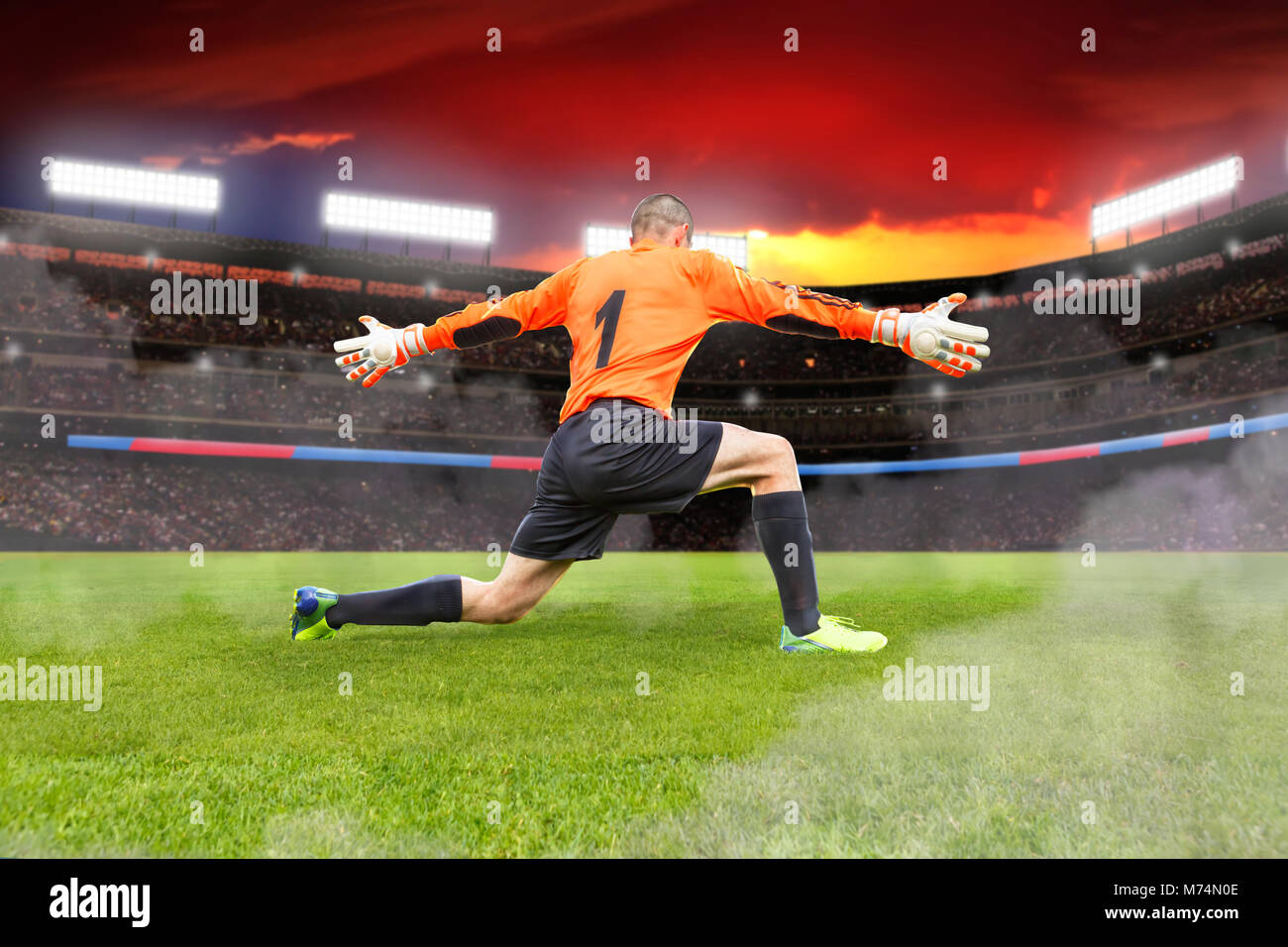 scenes from a soccer or football game with male player Stock Photo - Alamy