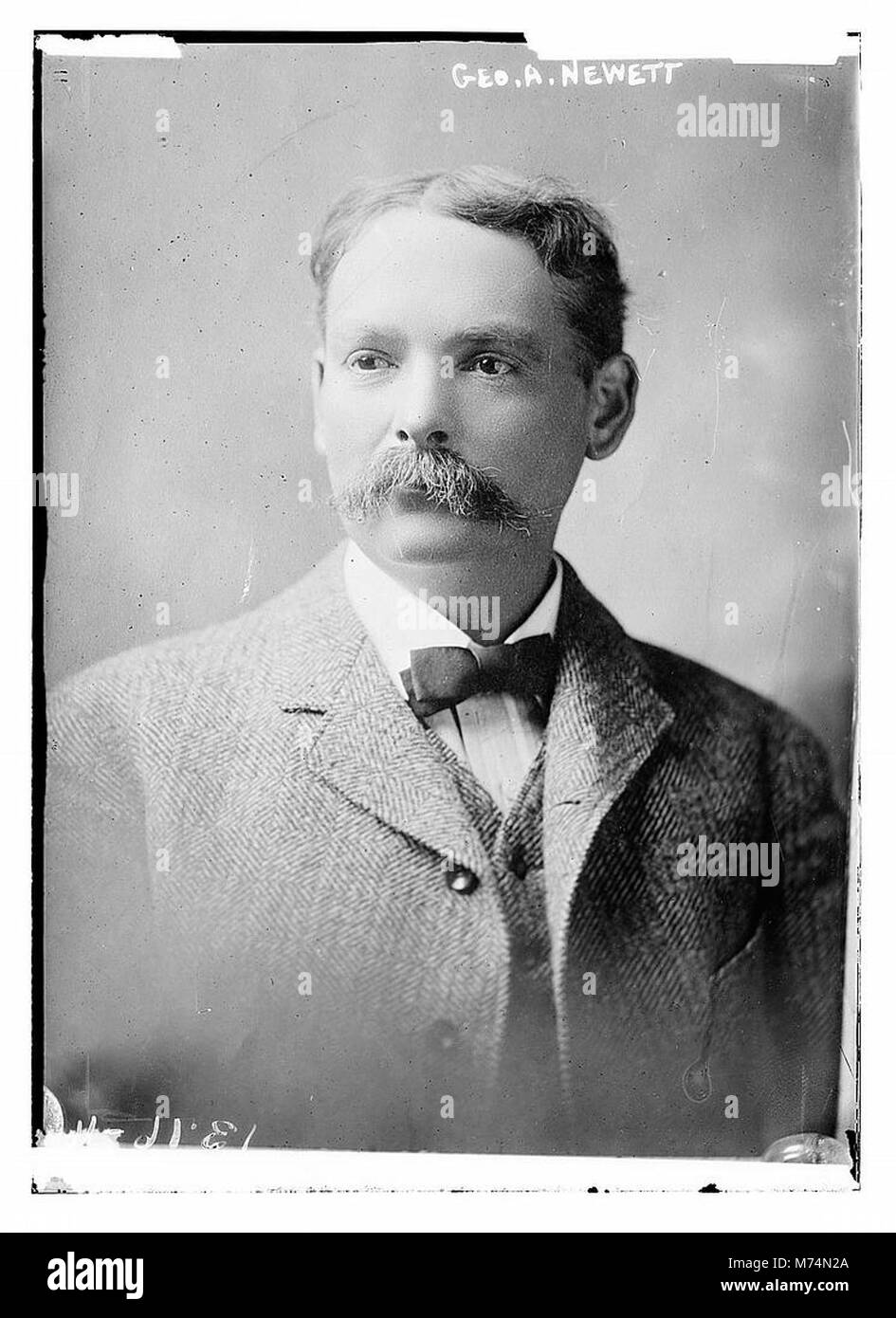 A formal portrait of Geo. A. Newett, providing a historical record of ...