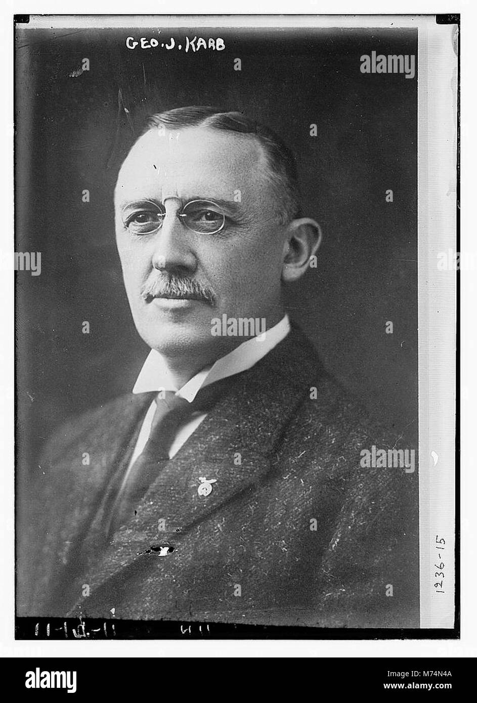 A portrait of Geo. J. Karb, capturing the figure of an individual with significance in American ...