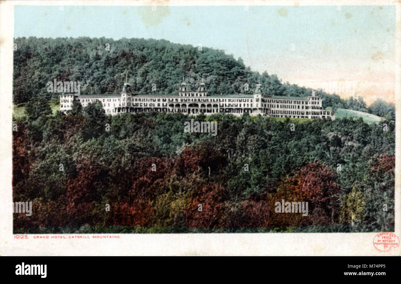 This photograph features the Grand Hotel, an iconic building known for ...