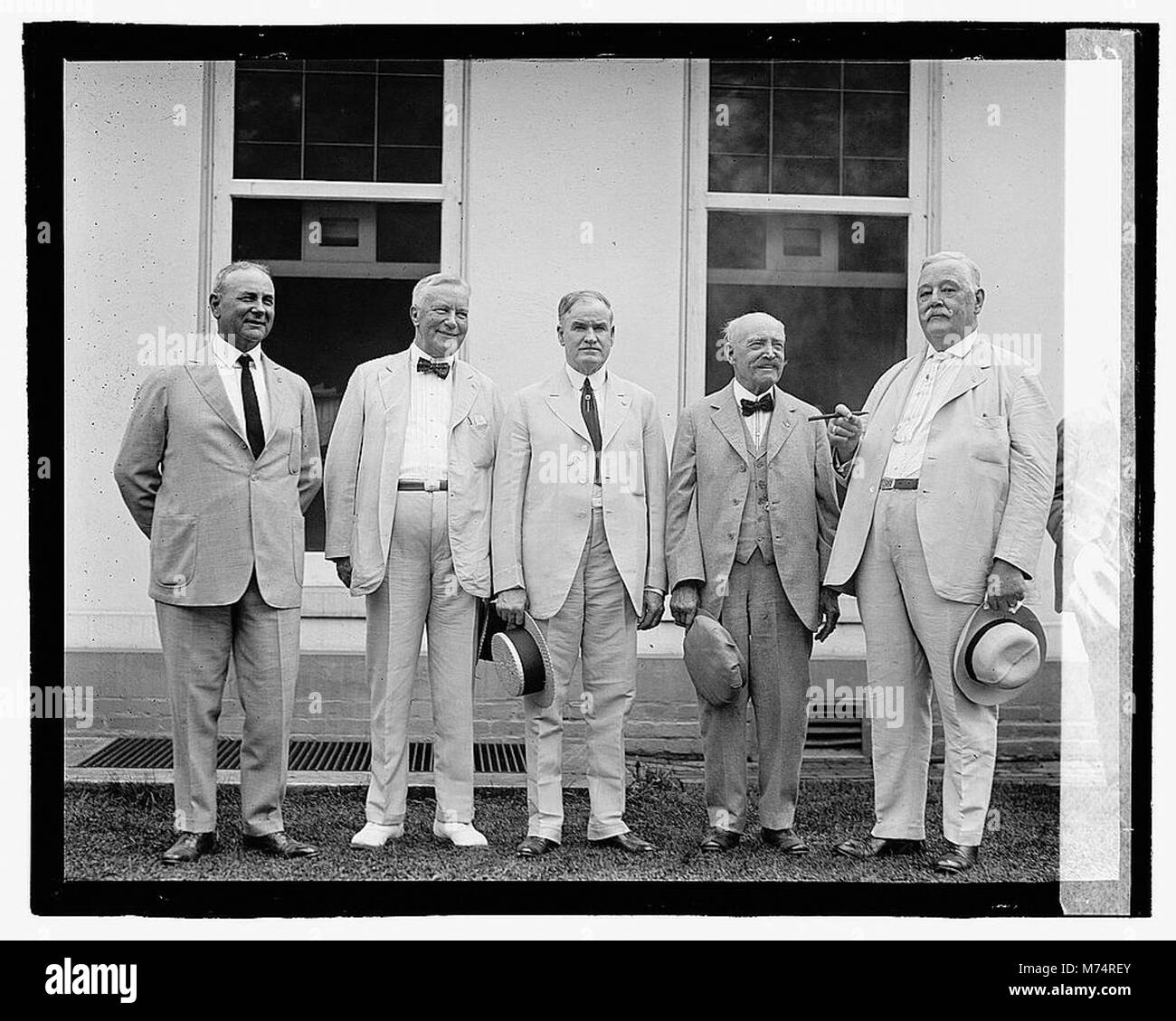 Group standing men in Black and White Stock Photos & Images - Alamy