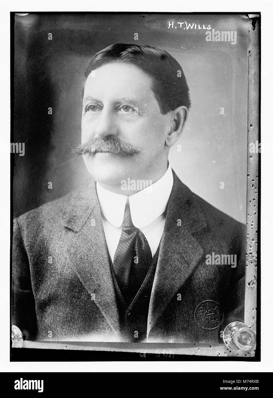 A portrait of H.T. Willis, a notable figure captured in a historical ...
