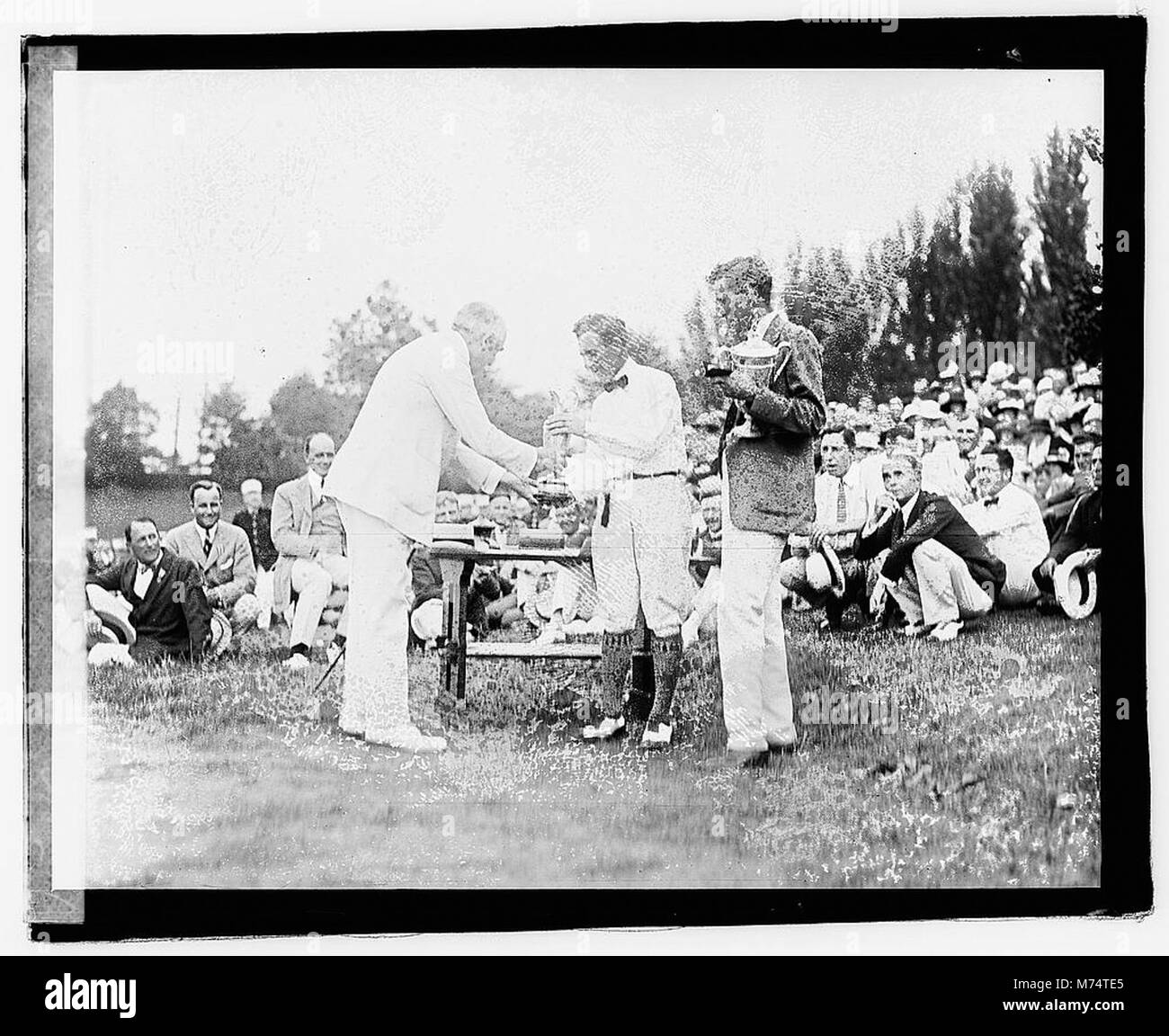 A photograph of Jack Harding, Hutchinson, and Jim Barnes taken on July ...