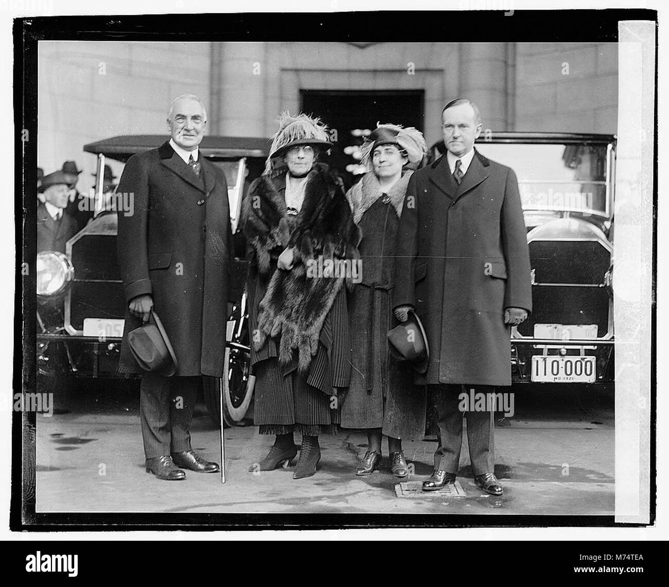 This historical image shows Mrs. H. Harding, Mrs. C., and President ...