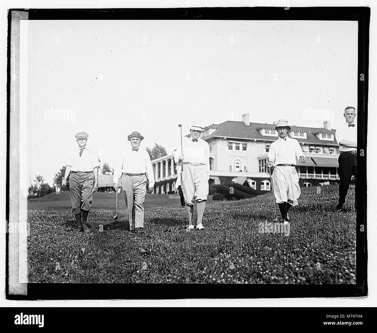 This image captures President Warren G. Harding participating in a golf ...