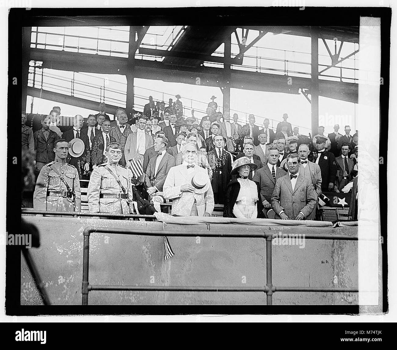 President Warren G. Harding is photographed attending a ball game on ...