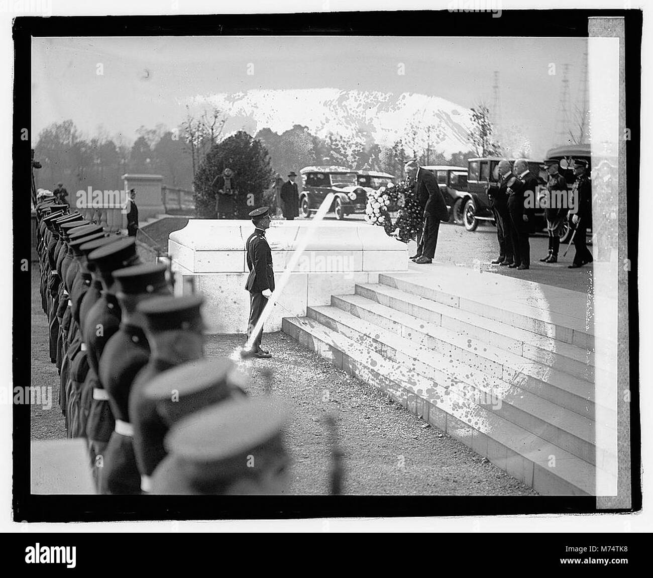 Photograph of President Warren G. Harding visiting the grave of an ...