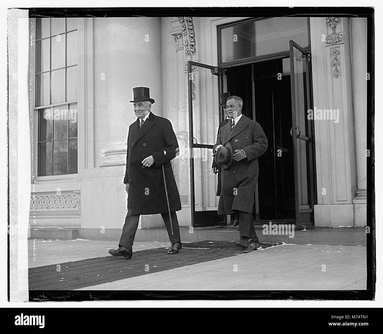 A photograph of President Warren G. Harding leaving the White House on ...