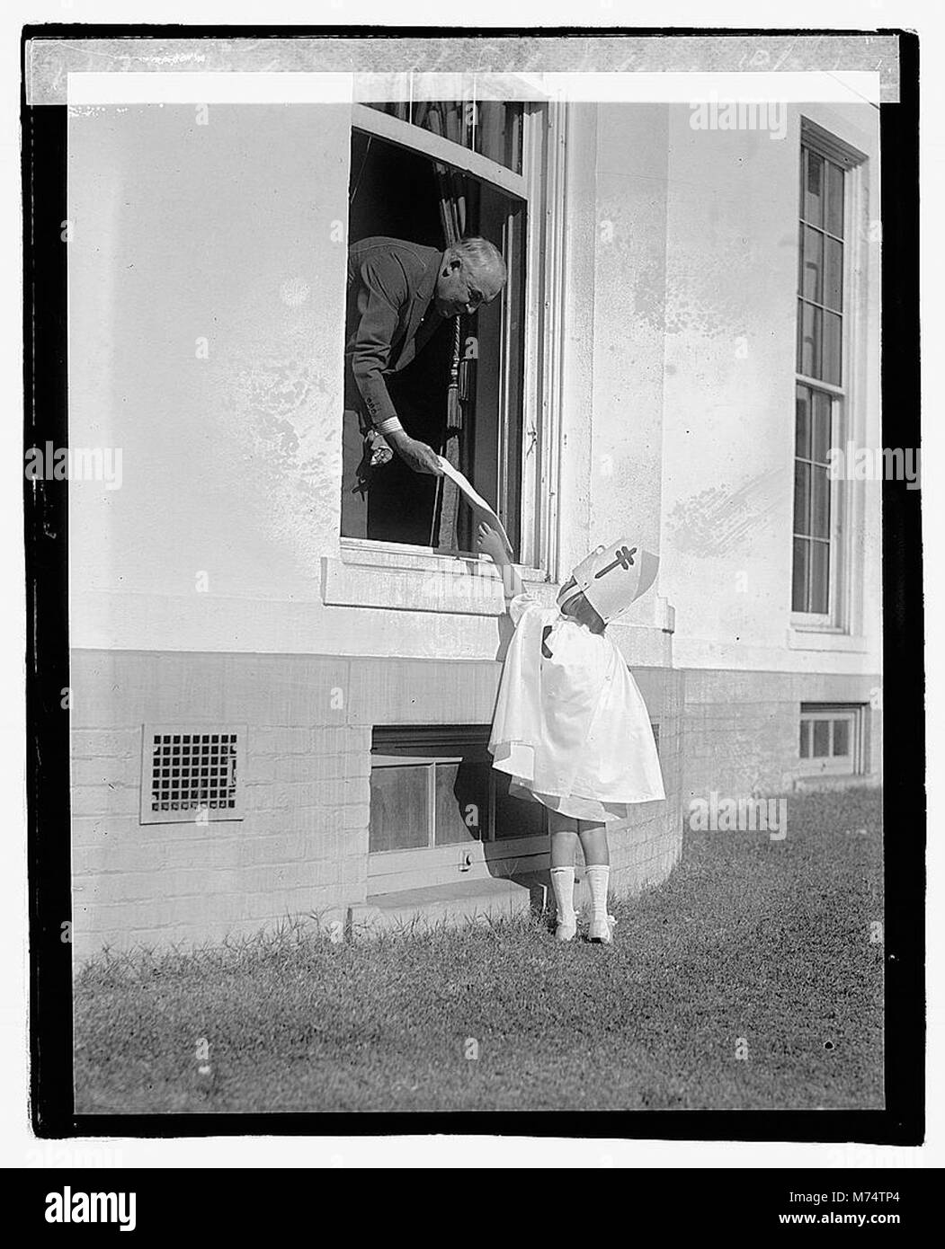 A photograph of President Warren G. Harding with Sally Lefevre, taken ...