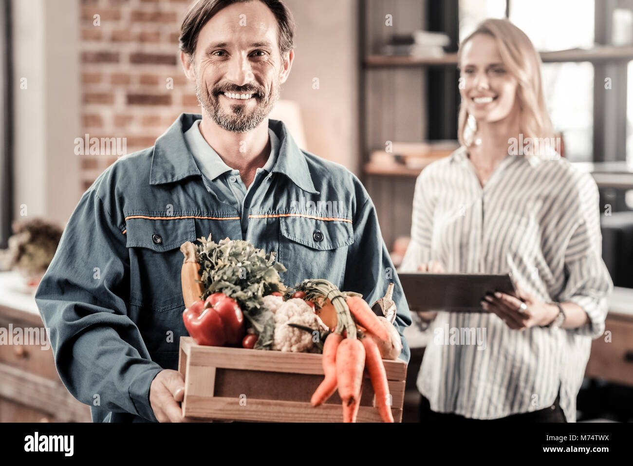 Handsome cheerful man looking at you Stock Photo - Alamy