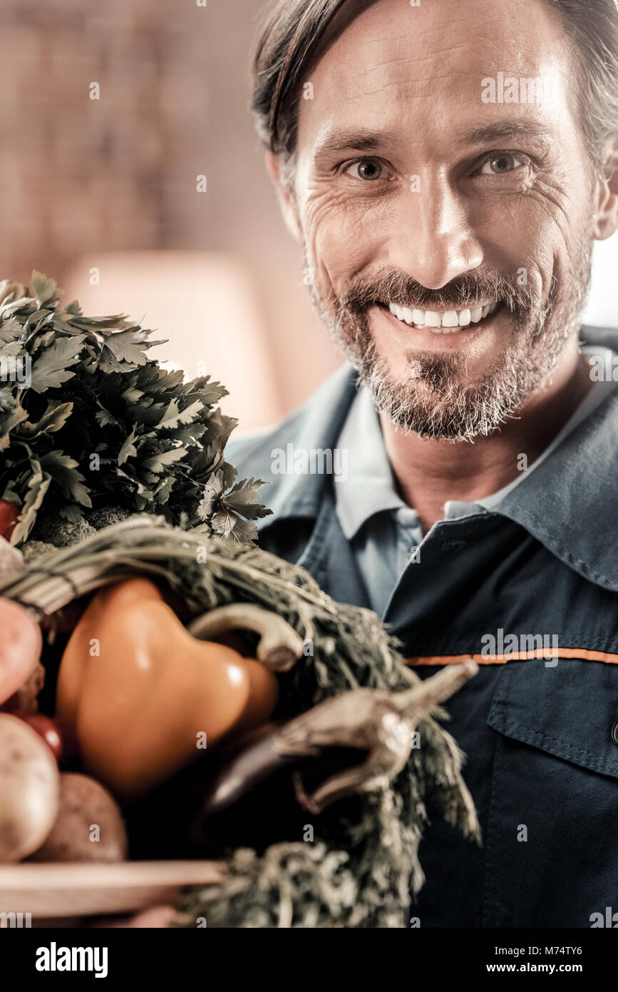 Portrait of a cheerful nice man smiling Stock Photo - Alamy