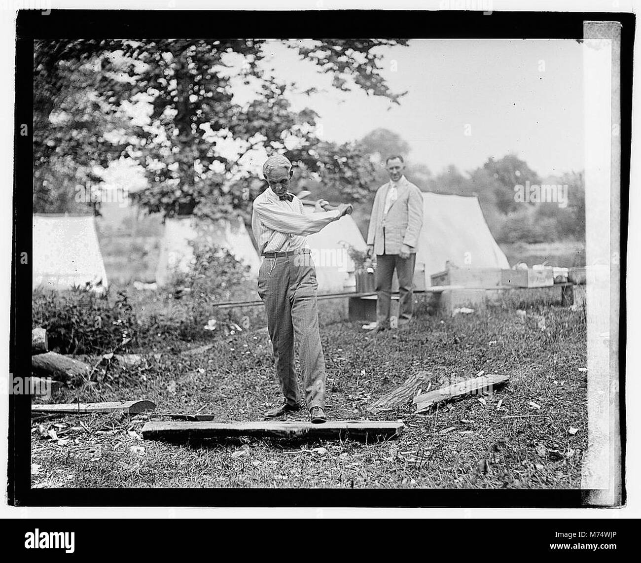 Henry Ford chopping wood LOC npcc.04715 Stock Photo - Alamy