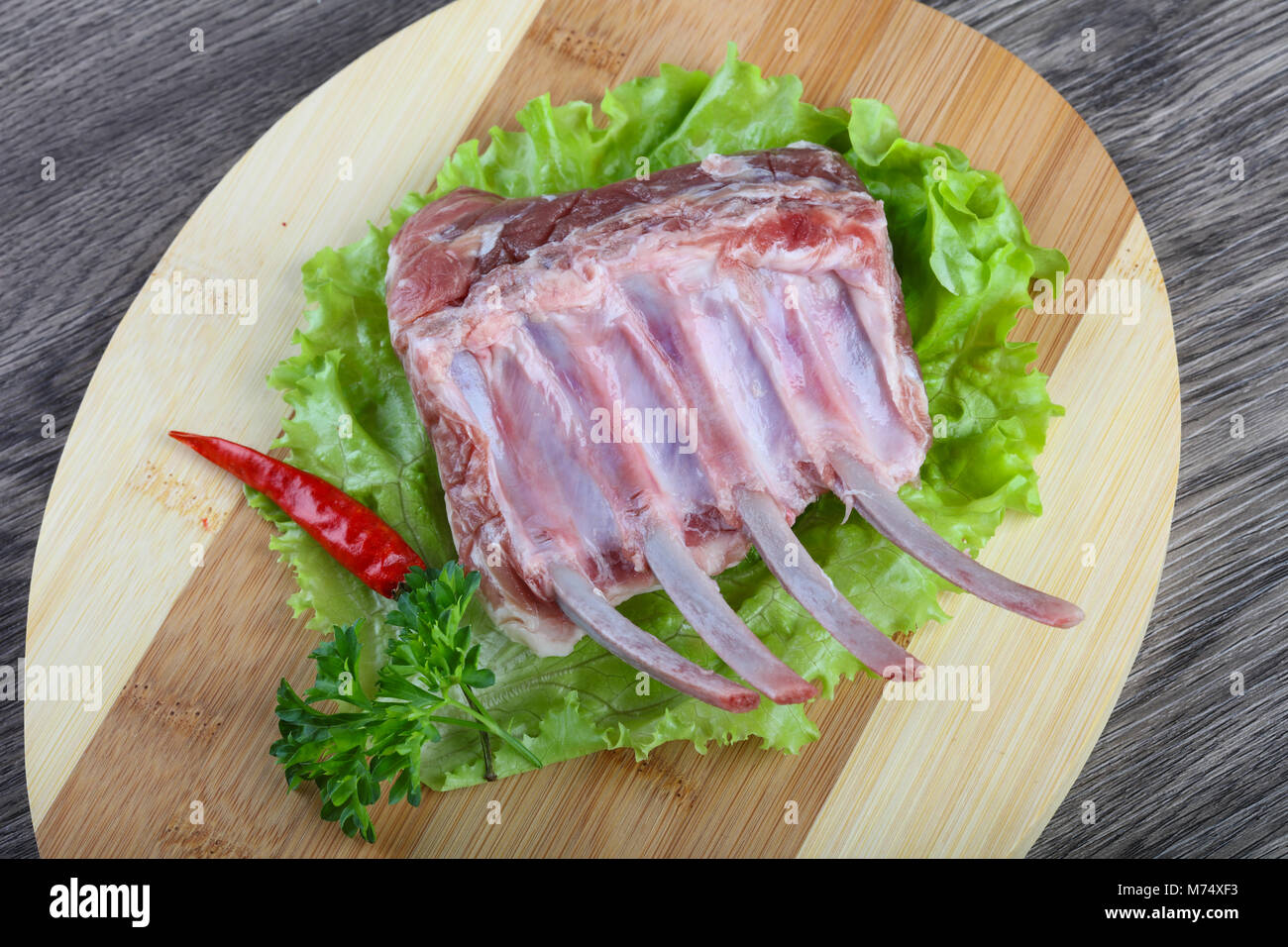 Lamb Frenched Rack 4 rib bone Stock Photo - Alamy