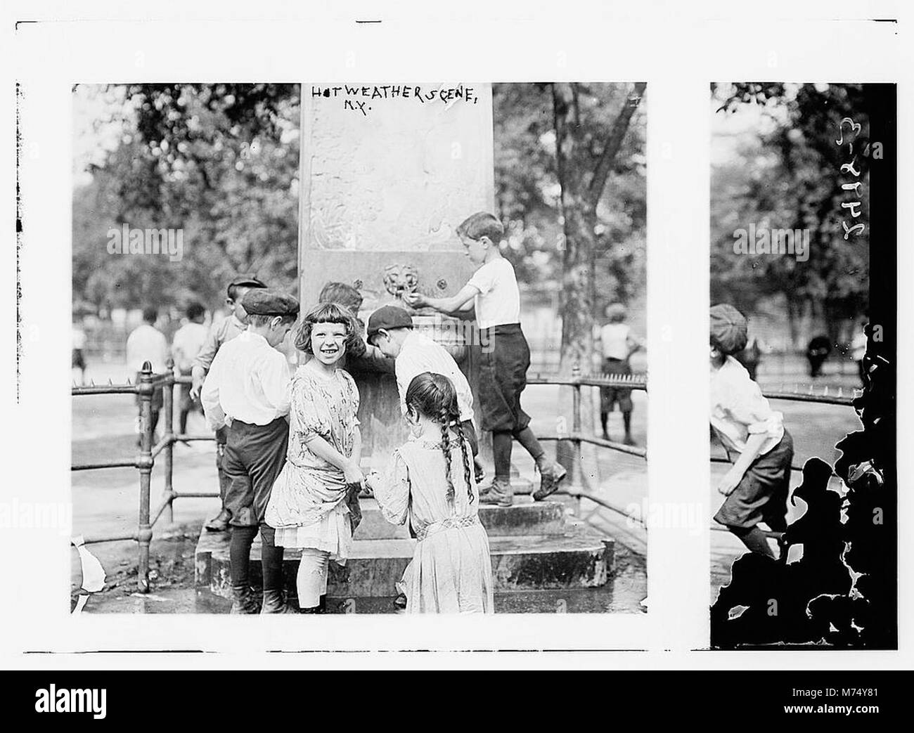 This photograph depicts a hot weather scene in New York City. It ...