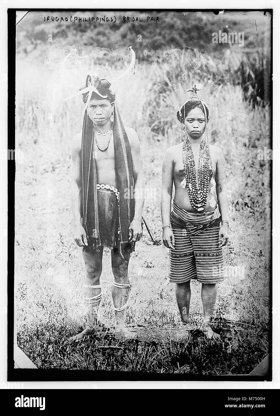 This photograph shows an Ifugao bridal pair from the Philippines ...