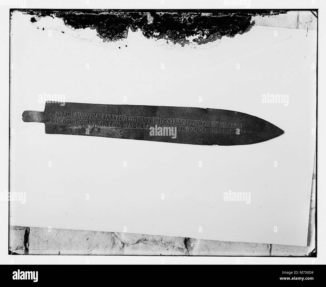 An inscribed ceremonial knife, likely of historical or cultural ...